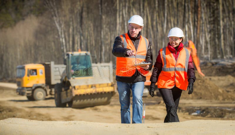 Road Workers Inspecting Construction Stock Image - Image of industry ...