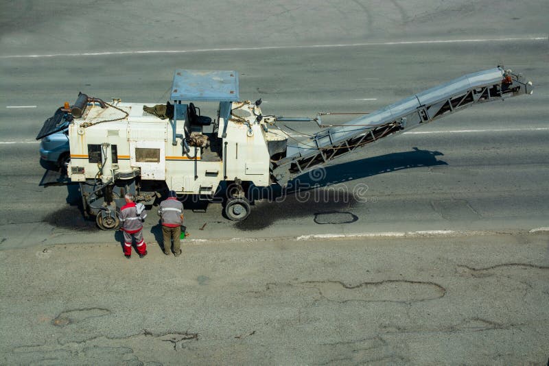 Road Workers are Standing Near Road Milling Machine. Stock Image ...