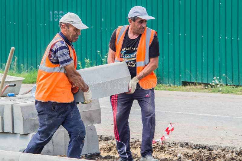 Road Workers at Work in Central Russia. Editorial Photography - Image ...