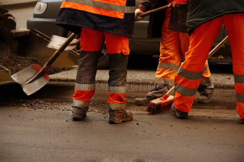Road Works with Men in Uniform Working with Tools Stock Photo - Image ...
