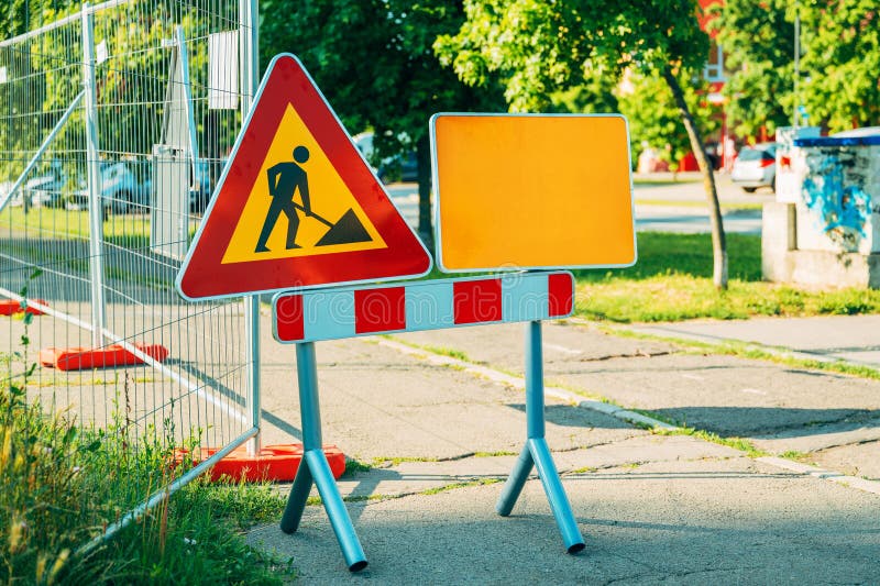Road Works Sign at the Construction Site Stock Image - Image of ...