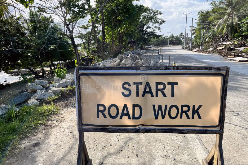 Road Works Start Sign with Dismantled Road Surface Behind, Danger on ...