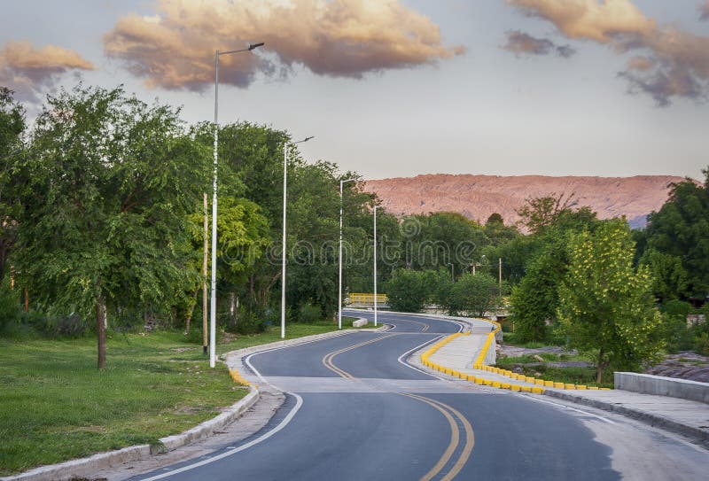 A Road with a Yellow Line Down the Middle Stock Photo - Image of summer ...