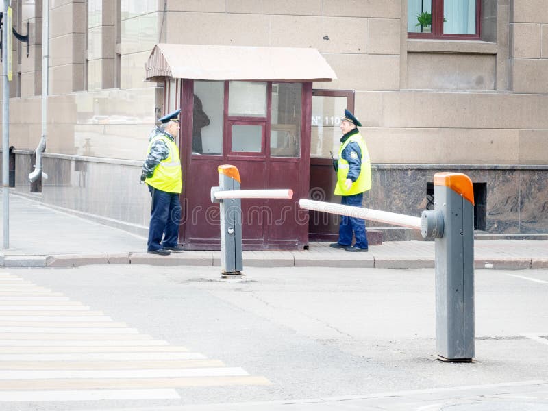 Roadblock with a Barrier and Security Guards Editorial Photo - Image of ...
