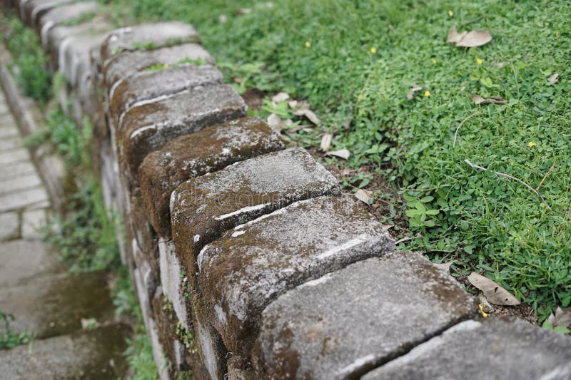 Roadblock Bricks in the Park Stock Photo - Image of floor, yellow ...