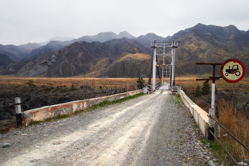 Roadside Chevron Board and Road. Stock Image - Image of altai, clouds ...