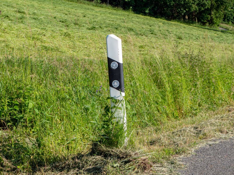 Roadside Post on a Country Road in Germany Stock Image - Image of curve ...