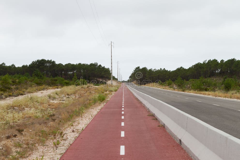 Roadside Red cycle path stock photo. Image of lane, track - 26769246