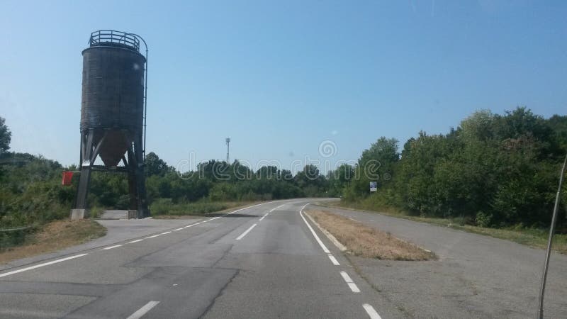 Roadside Water Tower stock image. Image of croatia, parking - 97762997
