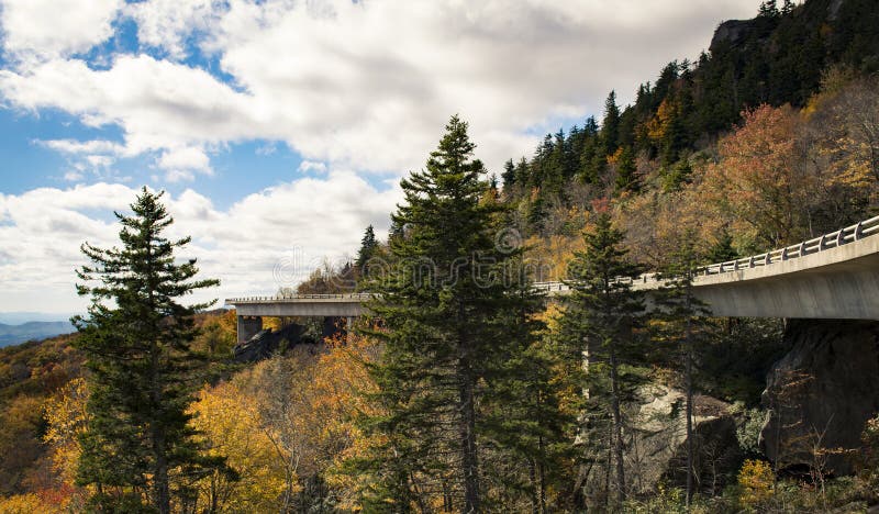 Roadway and Bridge in the Mountains during Fall and Fall Colors Stock ...