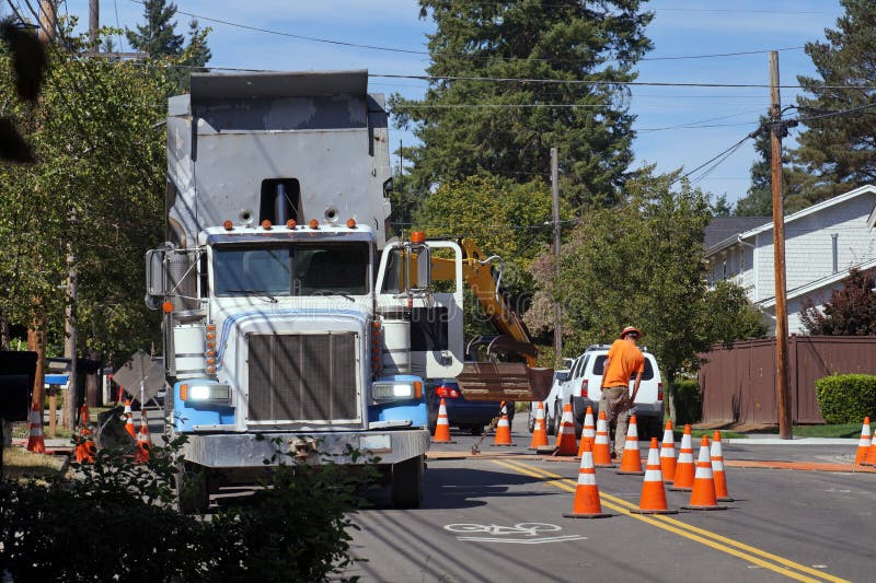 Roadworks. Replacement of Asphalt Road Surface. Dump Truck, Excavator ...