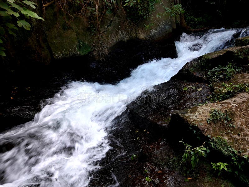 Roaring Water from the Waterfall Stock Image - Image of rock, light ...