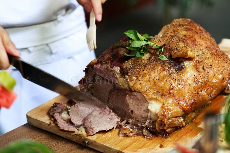 Roast Beef Chef Cut Piece Dinner Stock Photo - Image of knife, chef ...