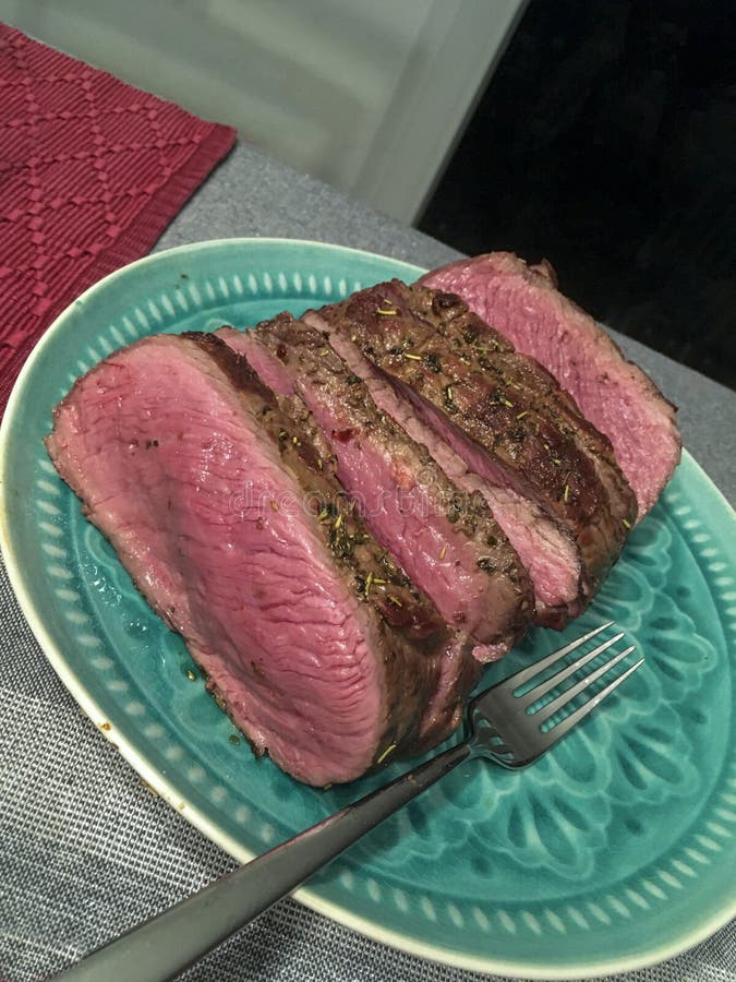 Roast Beef, Grilled Medium and Sliced on a Plate Stock Image - Image of ...