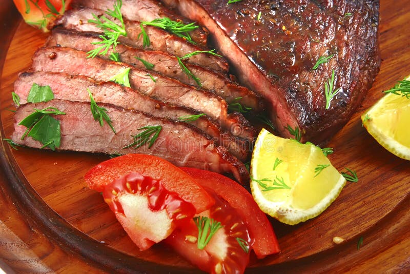 Roast Beef Meat with Tomato Stock Photo - Image of barbeque, marinated ...