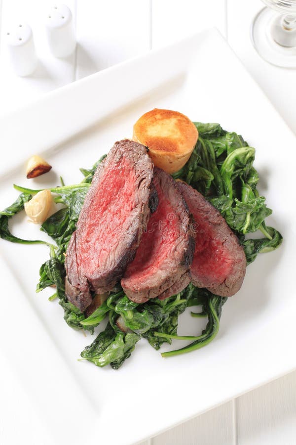 Roast Beef and Sauteed Spinach Stock Image - Image of sirloin, sauteed ...