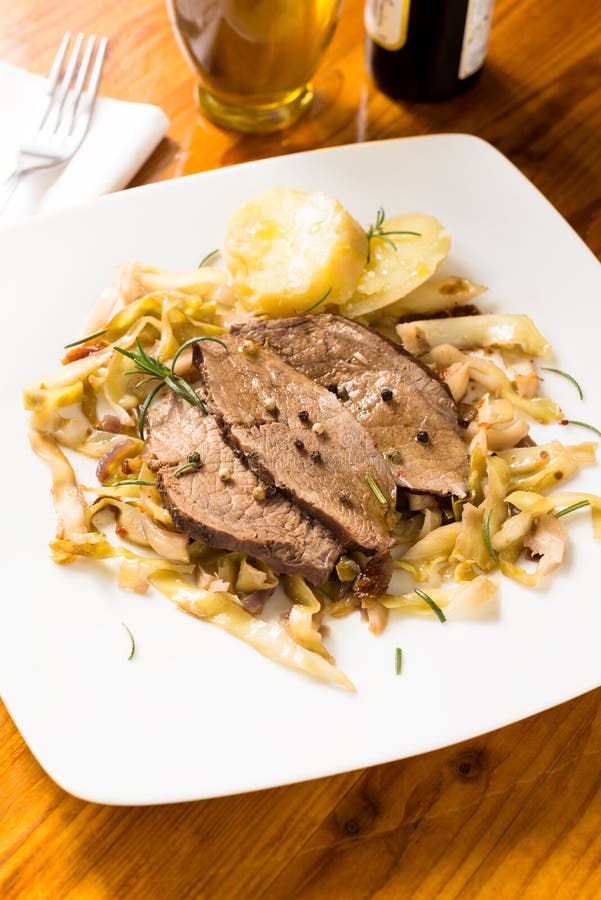 Roast Beef with Vegetable Garnish Stock Photo - Image of food, garnish ...