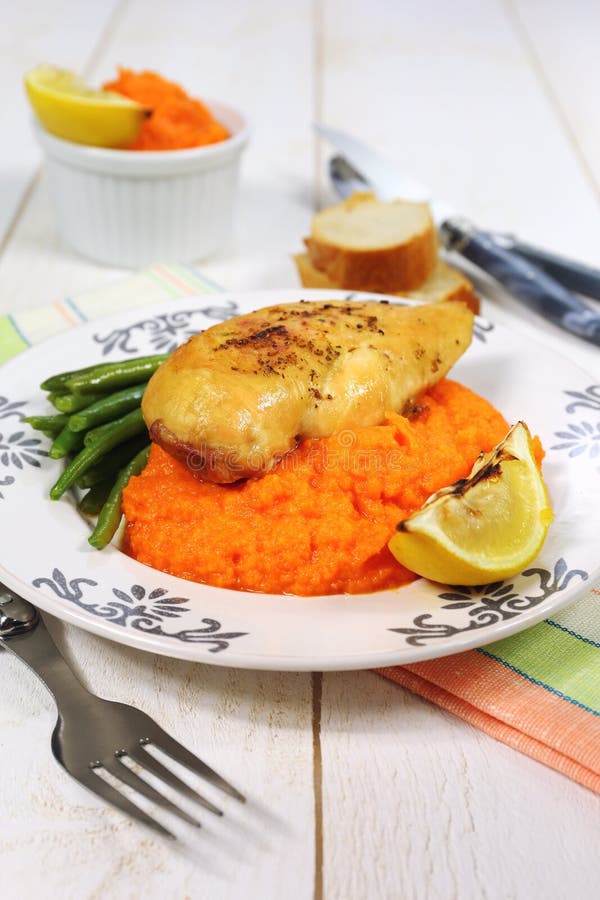 Roast Chicken and Carrot Puree Stock Photo - Image of mashed, beans ...