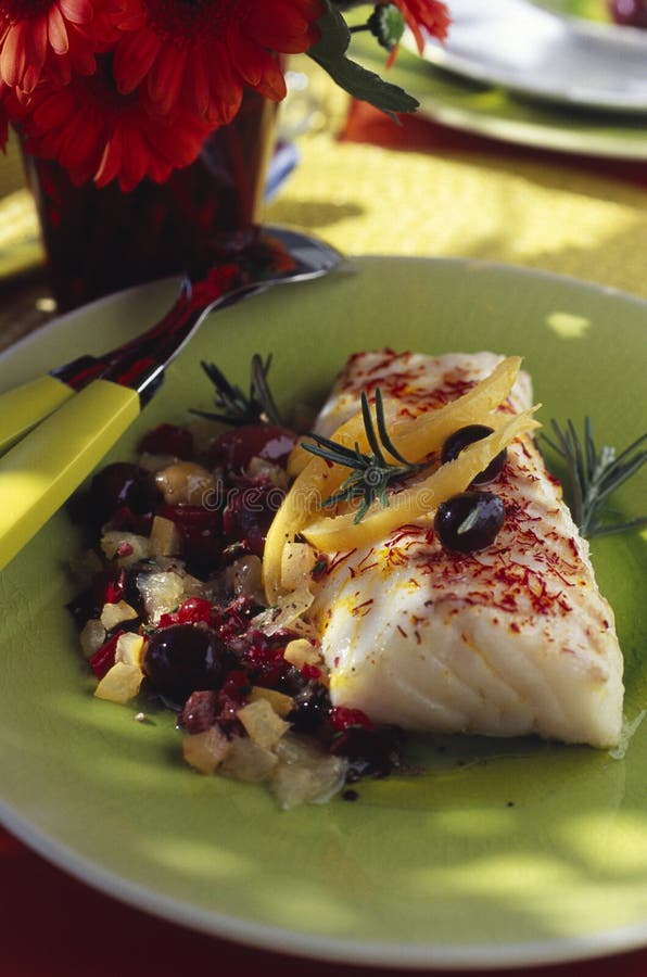 Roast Cod with Olives and Confit Citrus Stock Image - Image of green ...