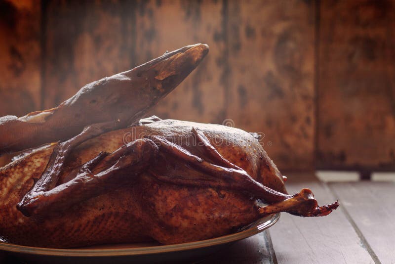 Roast duck on a plate. stock image. Image of herbs, natural - 86920053