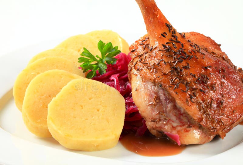 Roast Duck with Potato Dumplings and Red Cabbage Stock Image - Image of ...