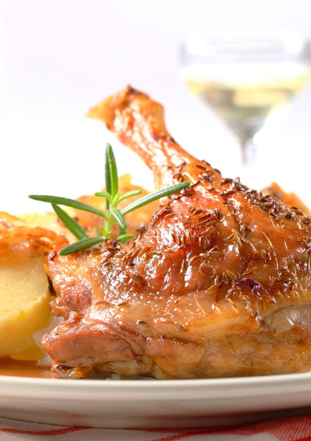 Roast Duck with Potato Dumplings and White Cabbage Stock Photo - Image ...