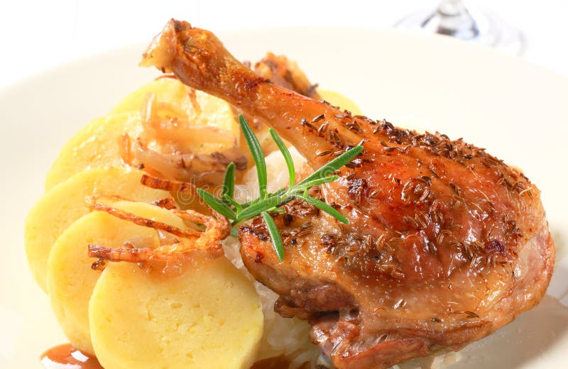 Roast Duck with Potato Dumplings and White Cabbage Stock Photo - Image ...