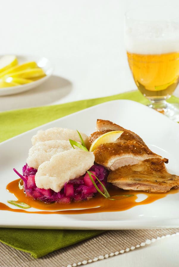 Roast Duck, Red Cabbage and Potato Dumplings Stock Photo - Image of ...