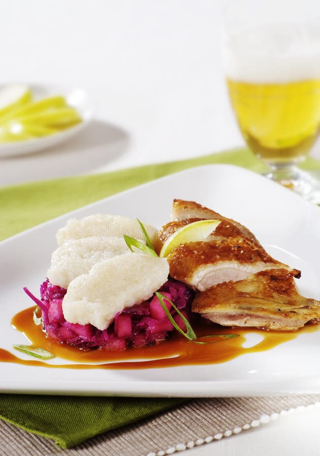 Roast Duck with Red Cabbage and Potato Dumplings Stock Photo - Image of ...