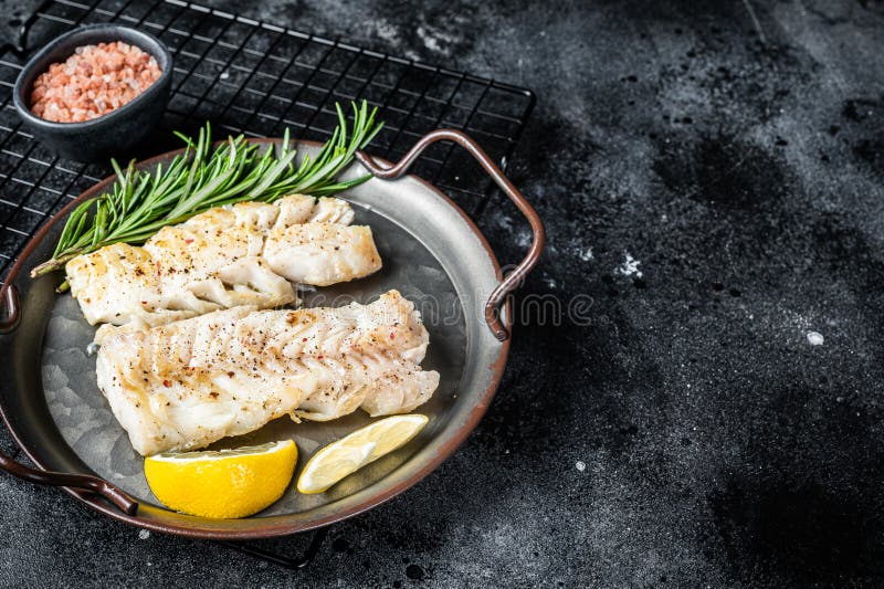 Roast Fillets of Codfish, Cooked Cod Fish Meat. Black Background. Top ...