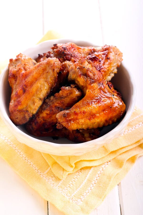 Roast flying chicken wings stock photo. Image of chicken - 63354278