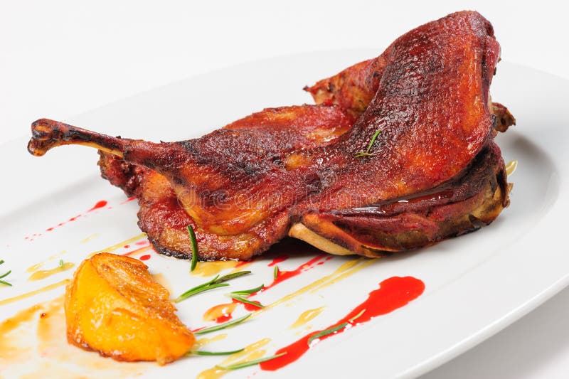 Roast Half of Duck with Caramelized Lemon Stock Image - Image of plate ...