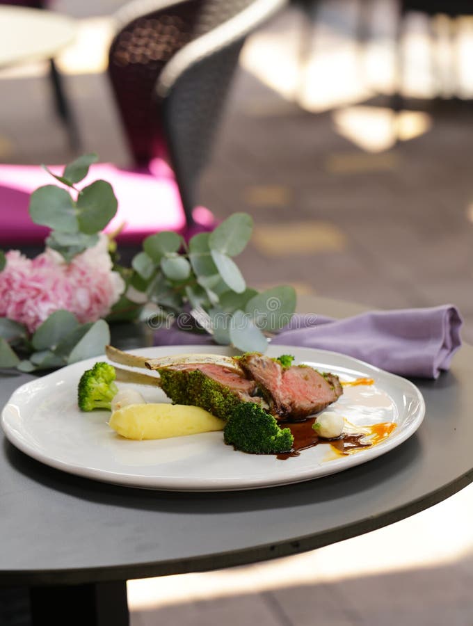 Roast lamb with vegetables stock image. Image of restaurant - 154751755