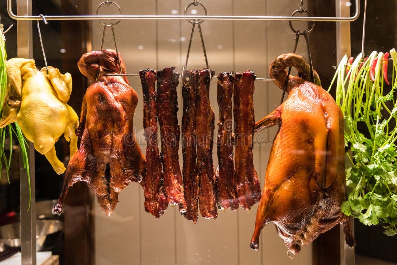 Roast meat stock photo. Image of meat, coriander, hanging - 67333922