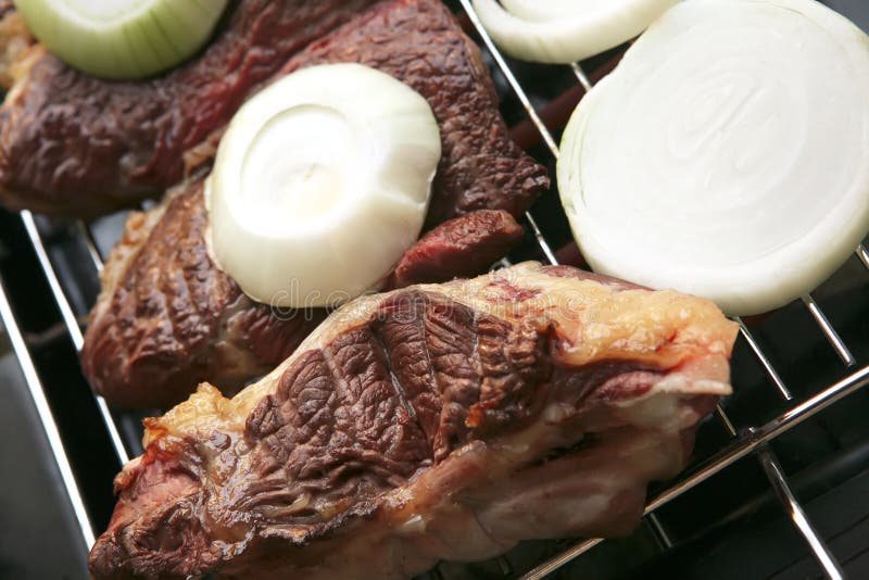 Roast Meat on Electrical Roaster Stock Photo - Image of mignon, meal ...