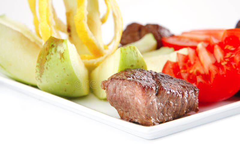 Roast meat served on white stock image. Image of isolated - 14960491