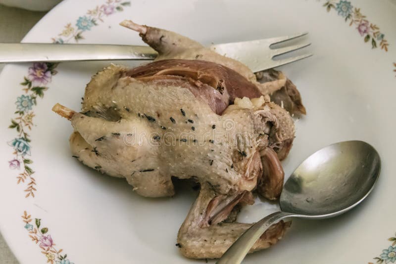 Roast Pigeon on a Plate Ready for Dinning Stock Photo - Image of ...