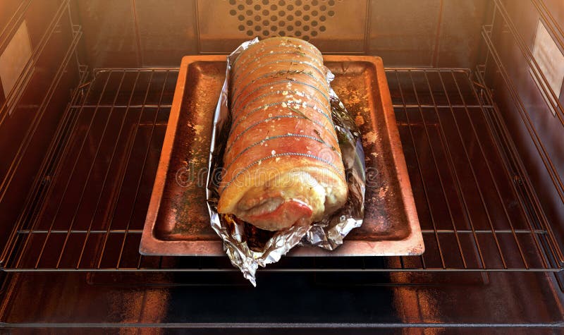 Roast Pork Inside the oven stock image. Image of ovenbake - 169855219