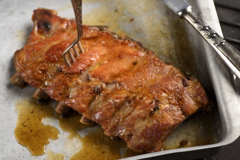 Roast Pork Rib on a Baking Sheet and with Stock Photo - Image of ...