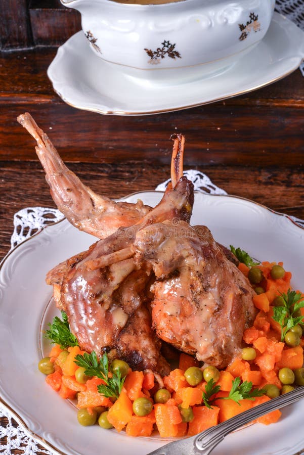 Roast rabbit stock photo. Image of indoor, peas, interior - 34164492