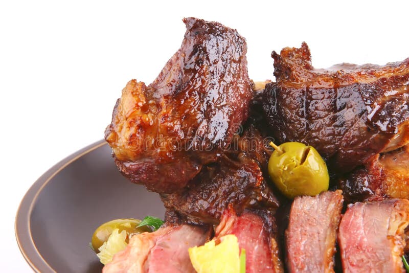 Roast Ribs on Old Style Ceramic Dish Stock Photo - Image of sauce ...