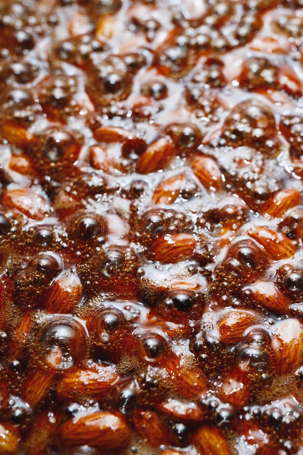 Roasted Almonds with Cinnamon Sugar Cooking Process, Top View Stock ... Roasted Almonds with Cinnamon Sugar Cooking Process, Top View Stock ...
