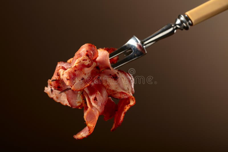 Roasted Bacon Slices with Rosemary on an Old Wooden Table Stock Image ...