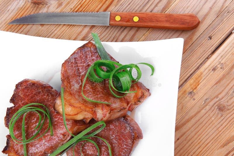 Roasted Beef Meat on Plate Over Wood Stock Image - Image of party, meat ...