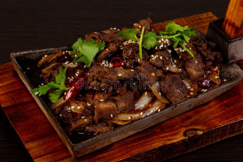 Roasted beef in the pan stock image. Image of grilled - 129144179