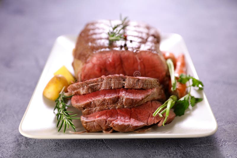 Roasted beef sliced stock photo. Image of barbq, steak - 272921180