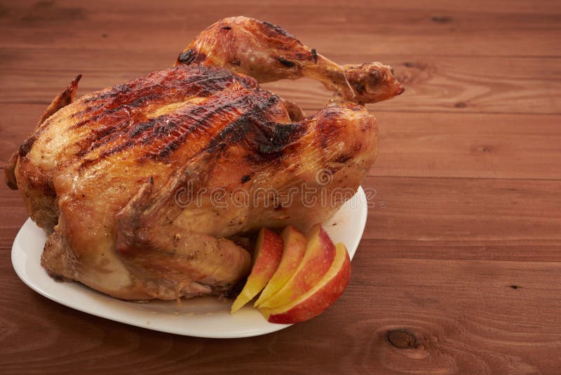 Roasted Bird on a Wooden Table Stock Image - Image of roasted, grilled ...