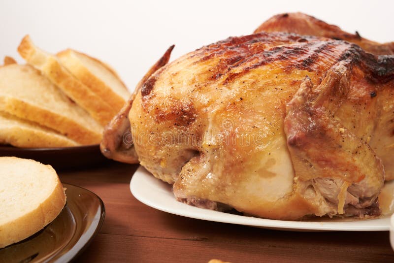 Roasted Bird on a Wooden Table Stock Photo - Image of sliced, cutting ...
