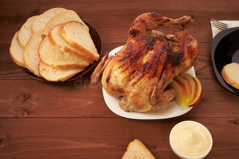 Roasted Bird on a Wooden Table Stock Photo - Image of barbecue, portion ...