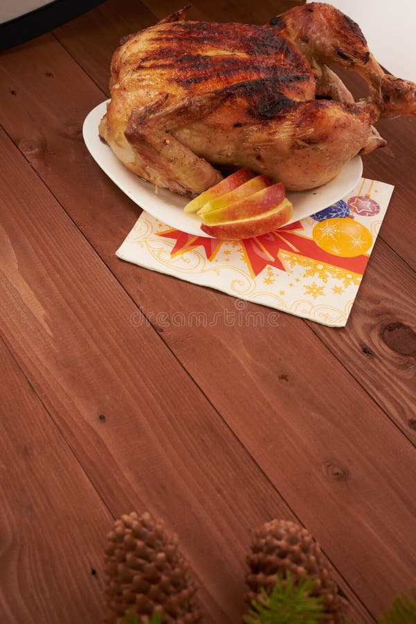 Roasted Bird on a Wooden Table Stock Image - Image of piece, grilled ...